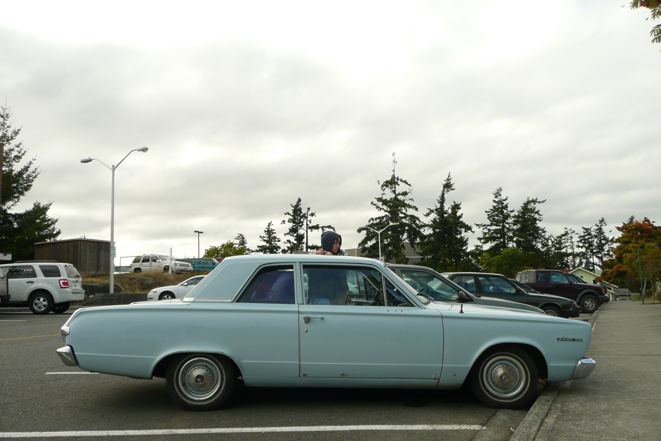 OLD PARKED CARS.: 1966 Plymouth Valiant 100.