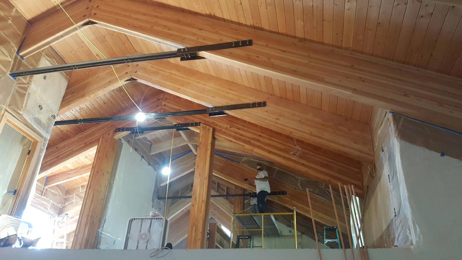 CCM Architecture : : Construction: Clear coating the car decking and beams