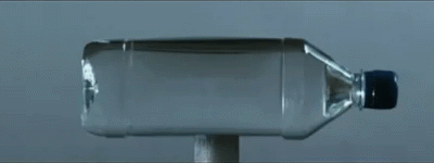 bullet hitting bottle of water - MechanicsTips
