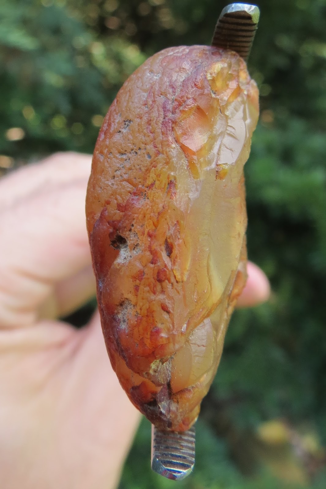 Archaeology of Portable Rock Art: Small translucent human head pebble ...