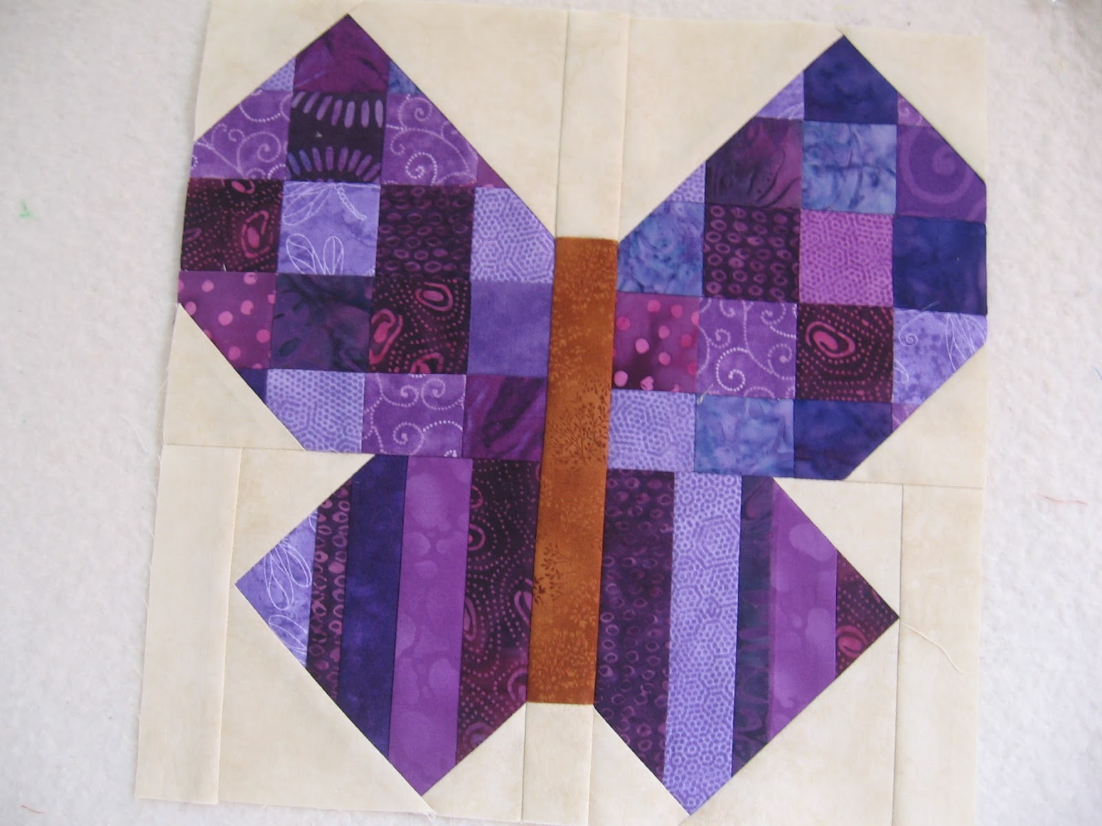 Purple scrappy butterfly quilt block | Butterfly quilt, Kaleidoscope ...