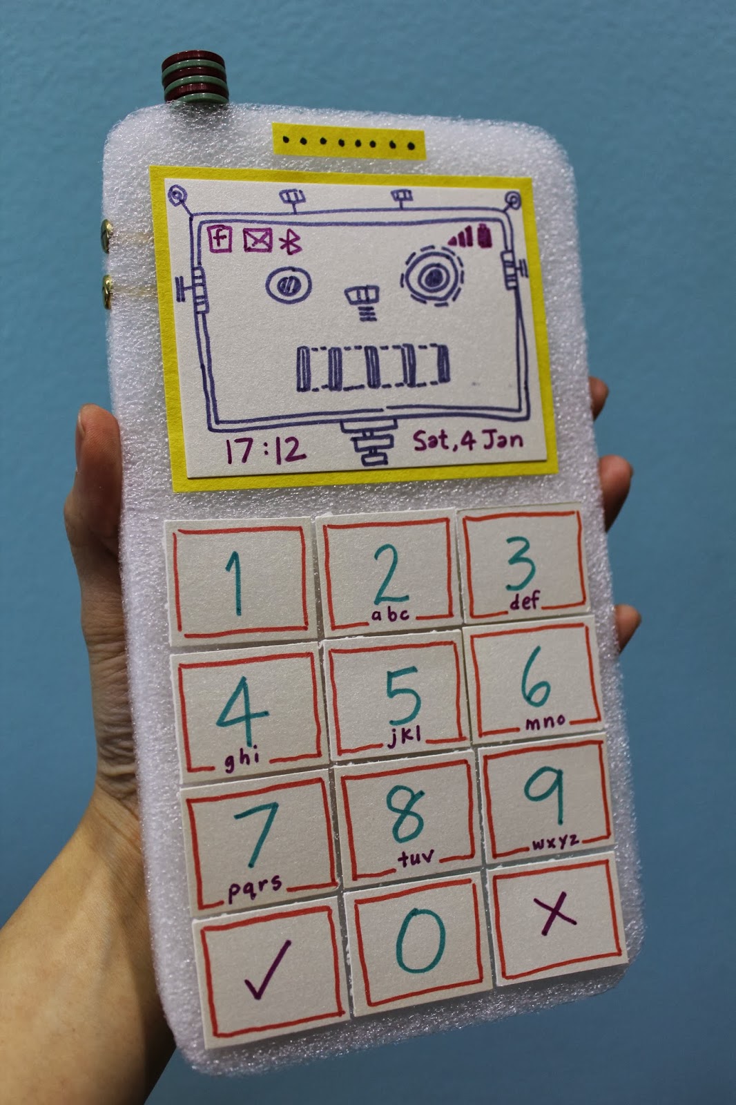 Hazelnutt House: Phone craft using foam and random bits