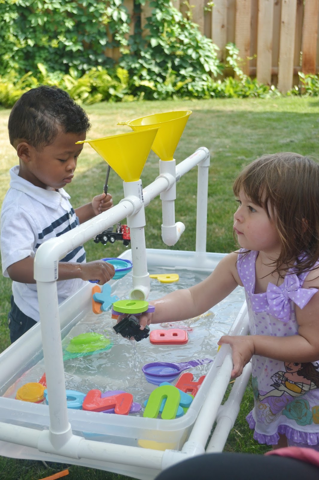 Our House in the Middle of Our Street: PVC Pipe Water Table