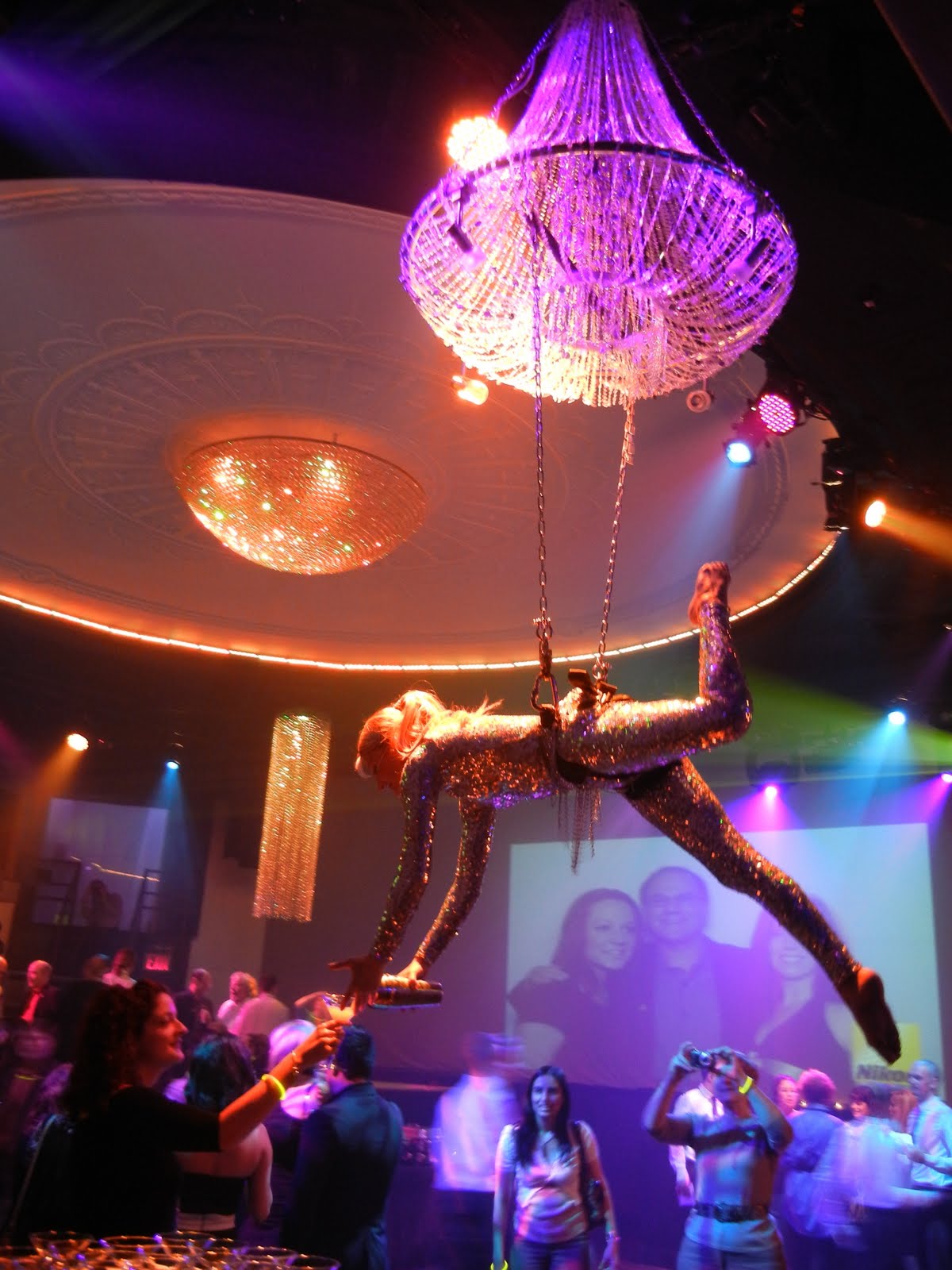 Aerial Human Chandelier bartender for Nikon event