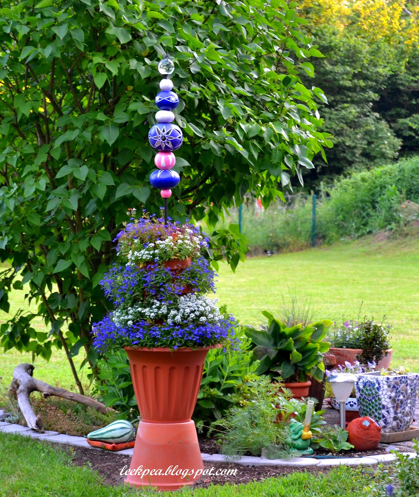 Leekpea: Aia lillepostament