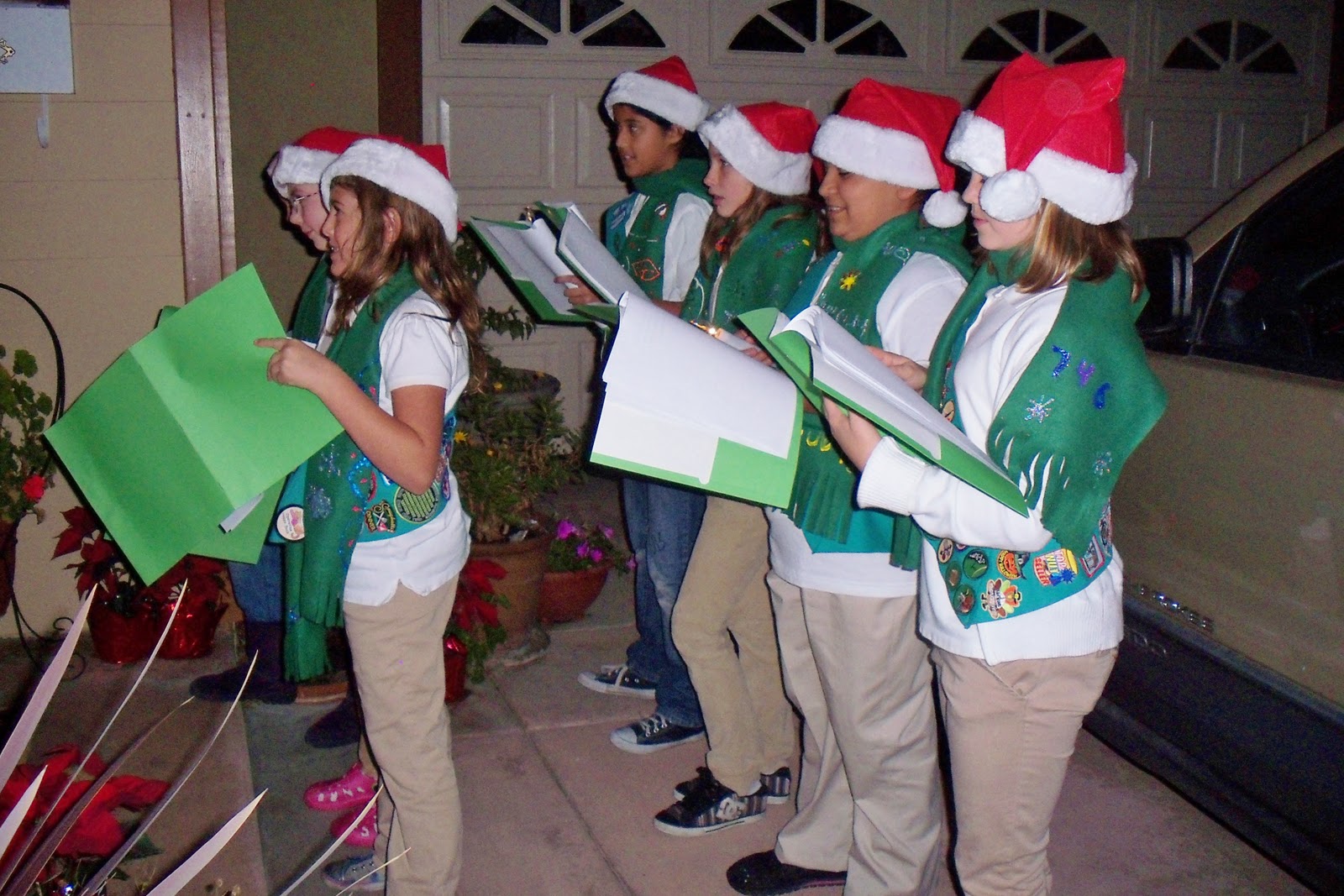 HUNTINGTON BEACH GIRL SCOUT TROOP 746: CHRISTMAS CAROLING 2011
