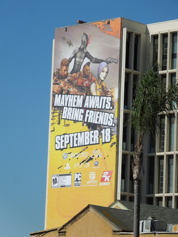 bridesmaids movie: Giant Borderlands 2 video game billboards...