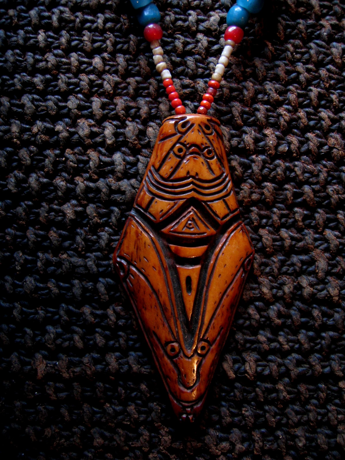 "ANCIENT AMULET IVORIES"