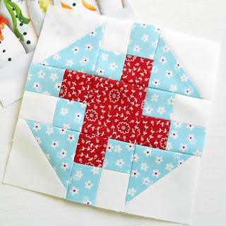 The Patchsmith: The Patchsmith's Spinning Churn Dash Block