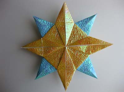 Origami-Instructions.com: Origami 2-Color 8-Pointed Star