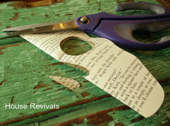 Open the quarter-fold and cut an upside-down heart for a nose. You can ...