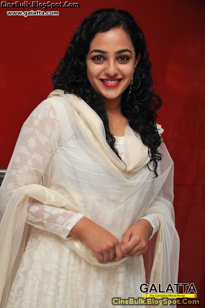 Nithya Menon Gorgeous in White Chudi Photo Gallery At Audio Launch of ...
