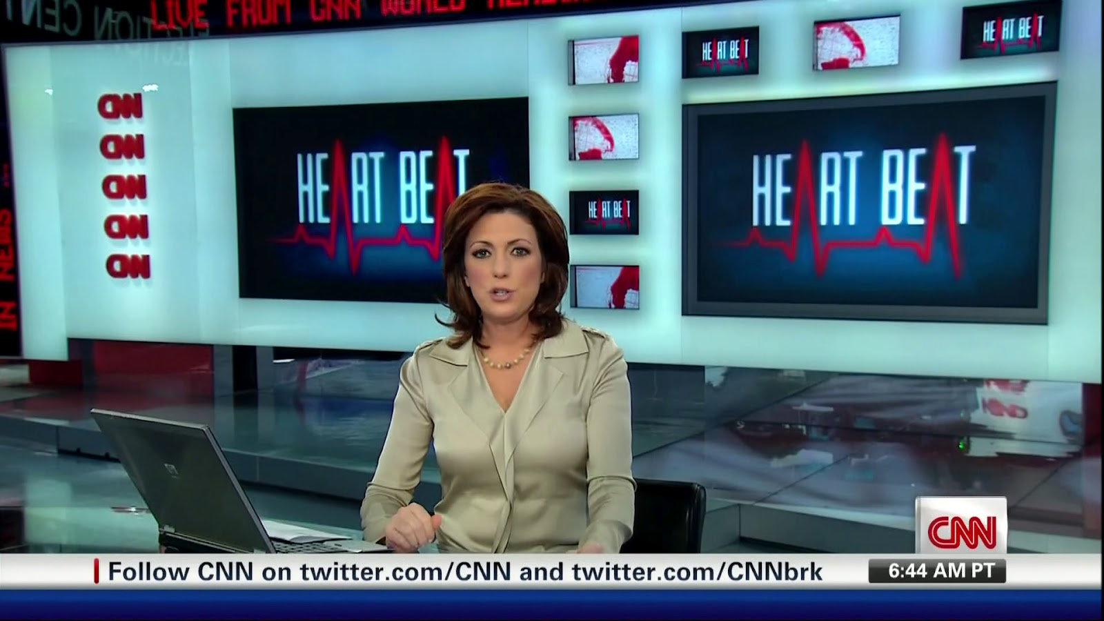 Ladies in Satin Blouses: Kyra Phillips - silver satin blouse