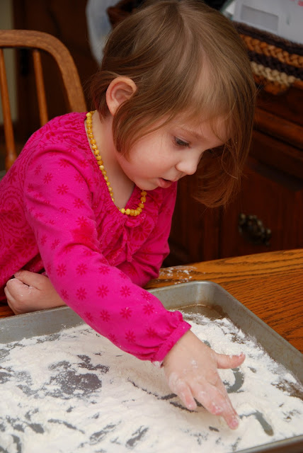 through mommy goggles: flour tray letters