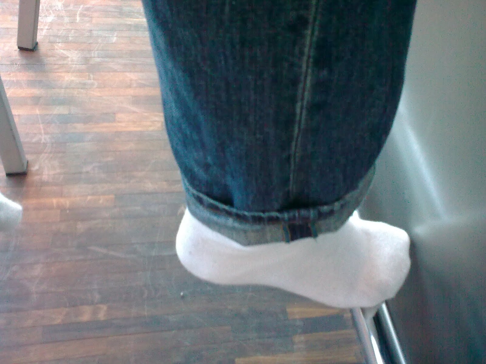 The White Socks Collection Project: candid socks in library of Almere