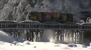TISOTIT: Spectacular Footage of Train Plowing Through Deep Snow