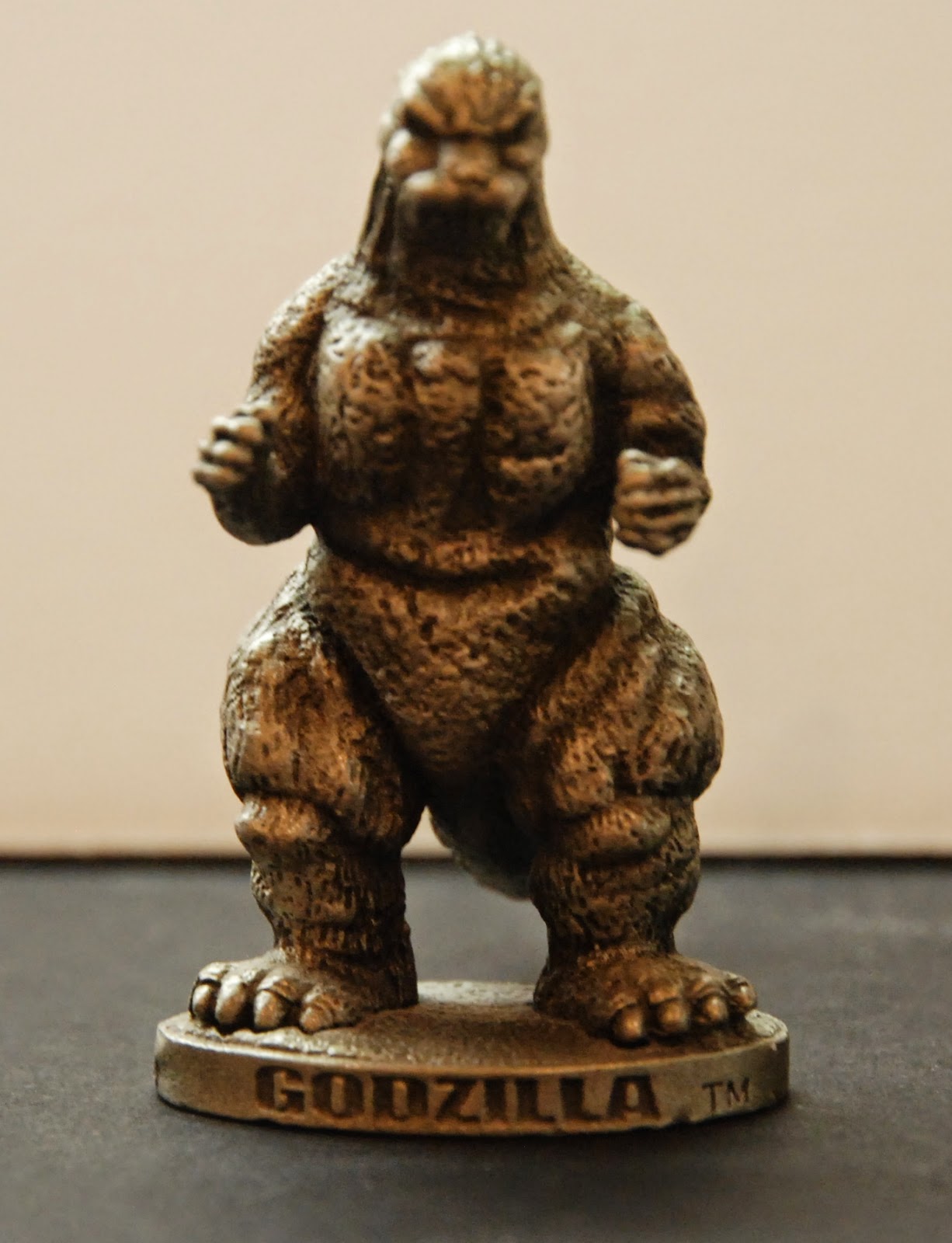 the sphinx: Pewter Godzilla Figurine (Fossil, 1995)