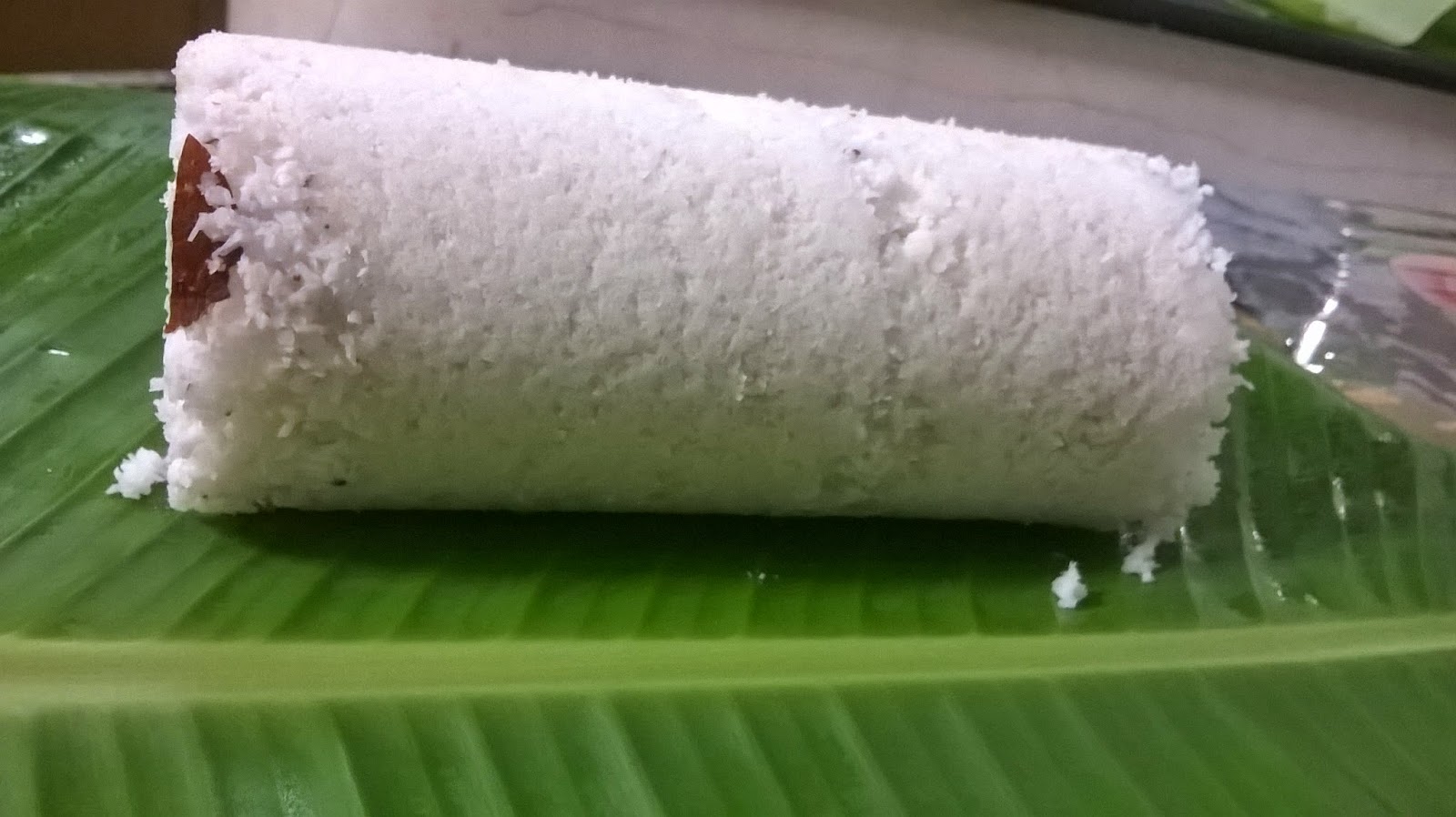 PUTTU (Rice Powder steamed with layers of grated coconut in cylindrical ...