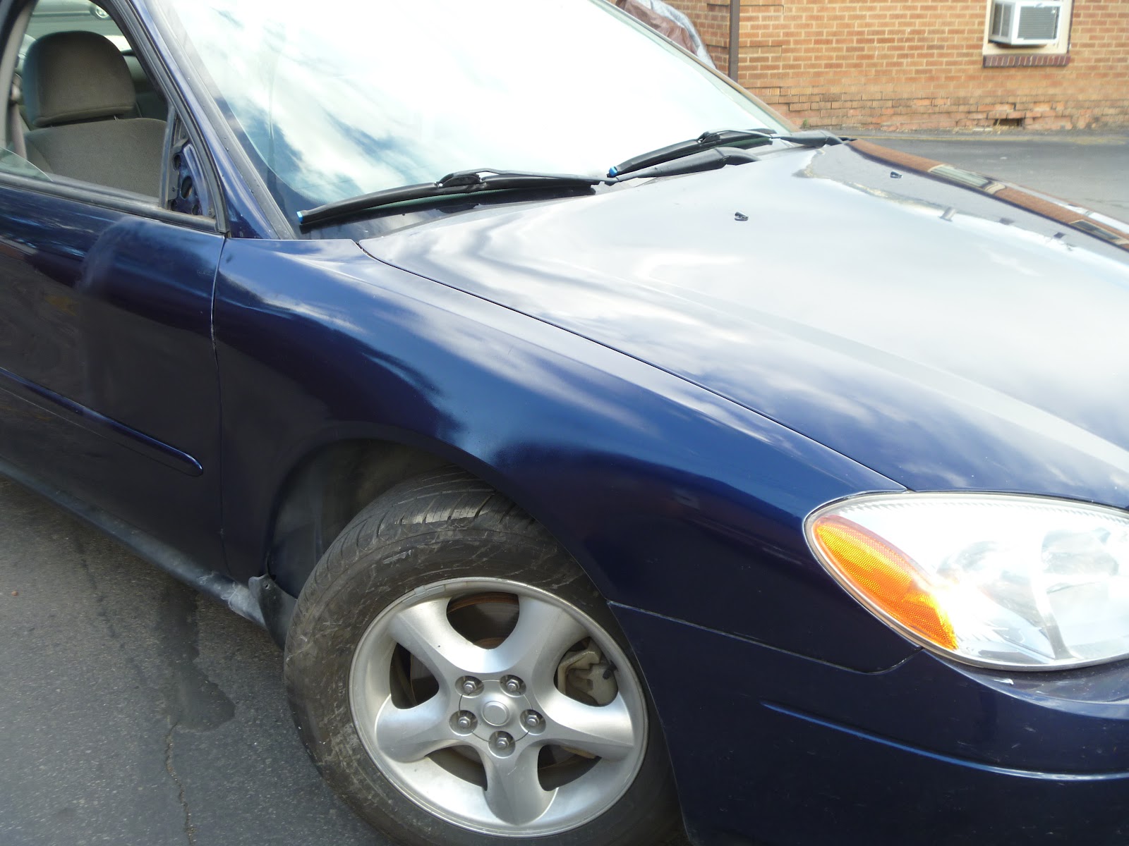 Growing tall in our little Corner: Fixing my dented fender