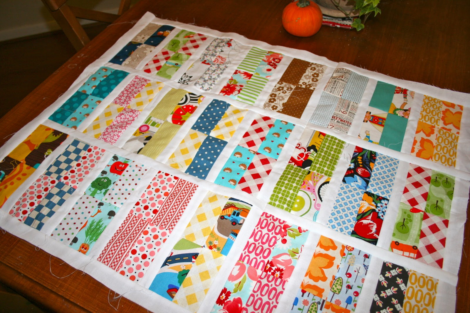 The Tulip Patch: Skinny 4-patch {scrap quilt in progress}