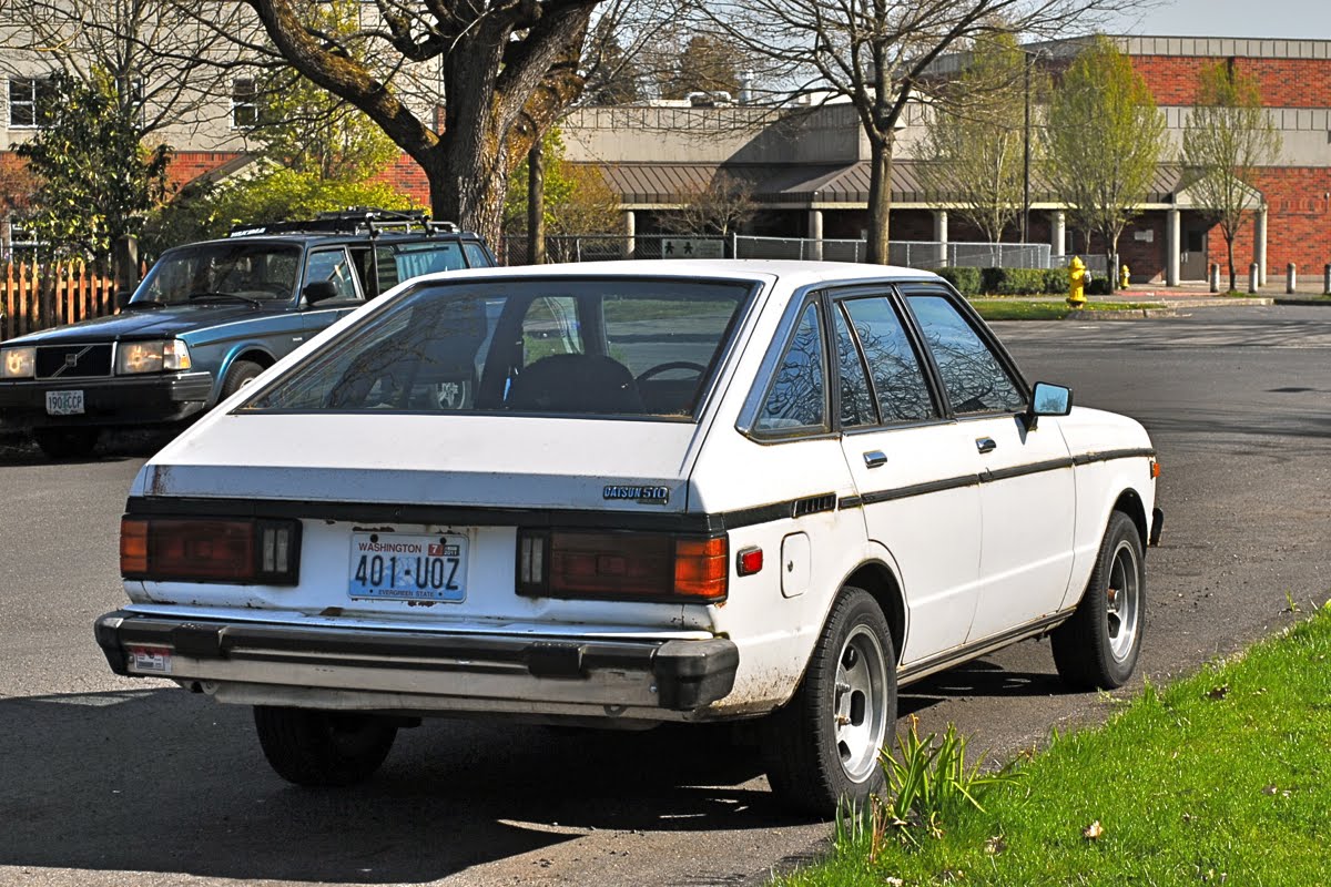 OLD PARKED CARS.: 1981 Datsun 510.