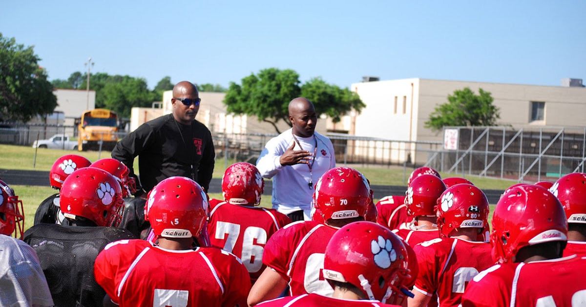 Terrell Daily Photo: Coach Wilson gives direction to the young Tigers