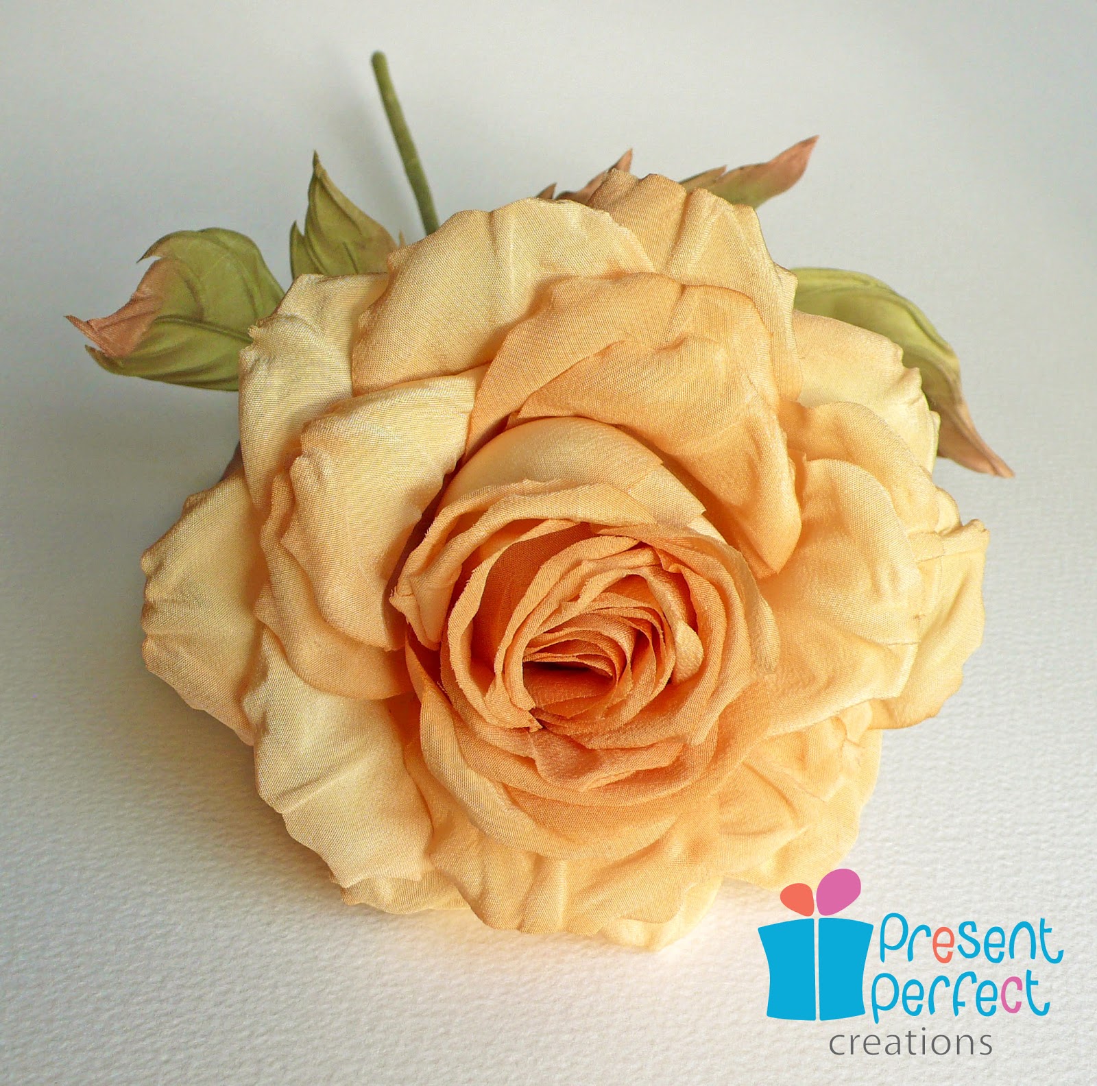 Present Perfect Creations: A large tea-coloured rose