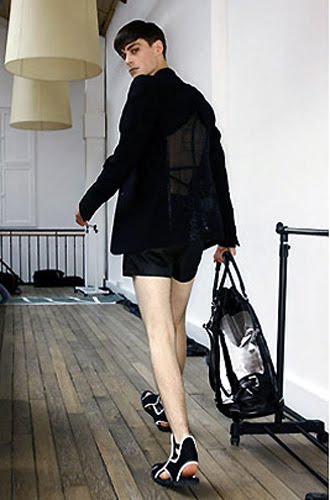 Boys in short shorts: Fit fashion model in short shorts