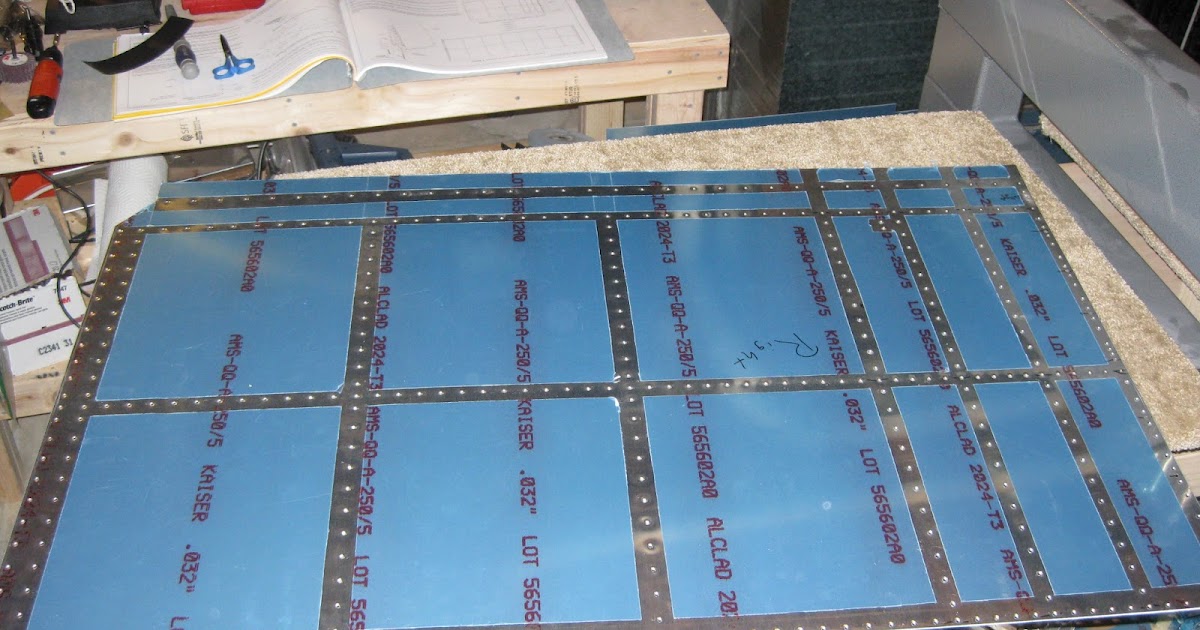 E's Van's RV-14A: Wings. Top skins. Dimpled.