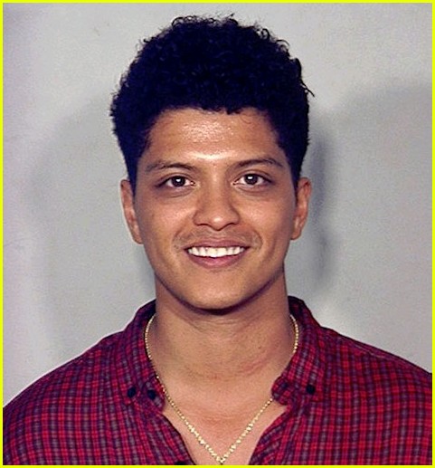 Smiling Bruno Mars in Red Square Shirt