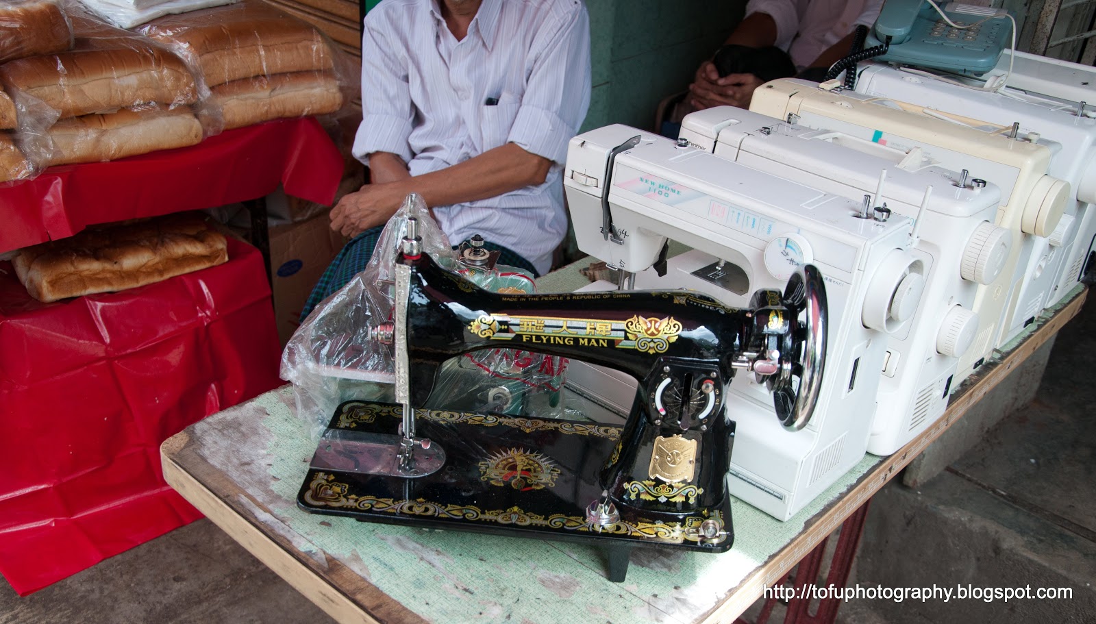 Tofu Photography: Flying man sewing machine