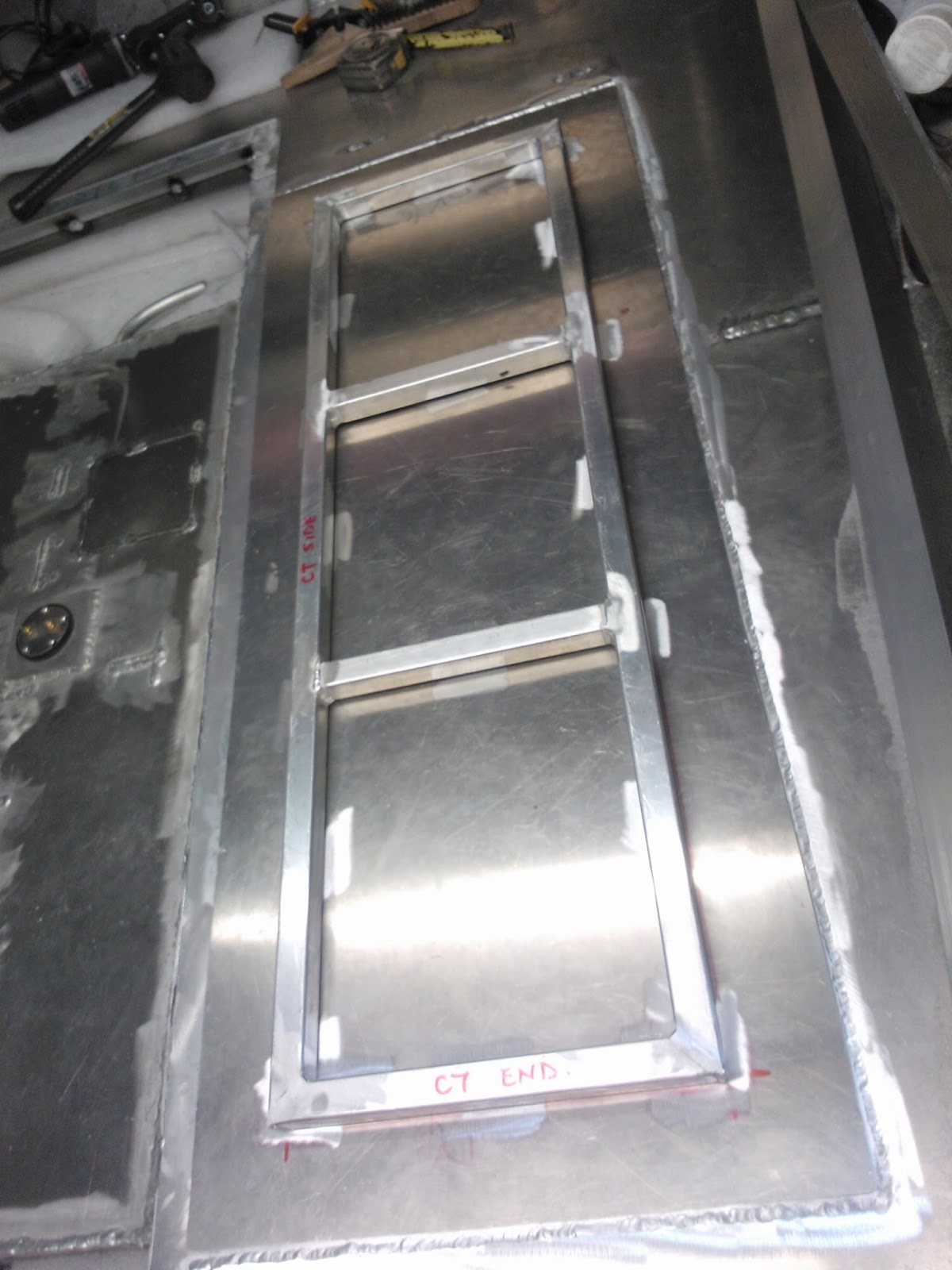 Hatches, bilge pump, fuel lines, bungs (Day 62 & 63)