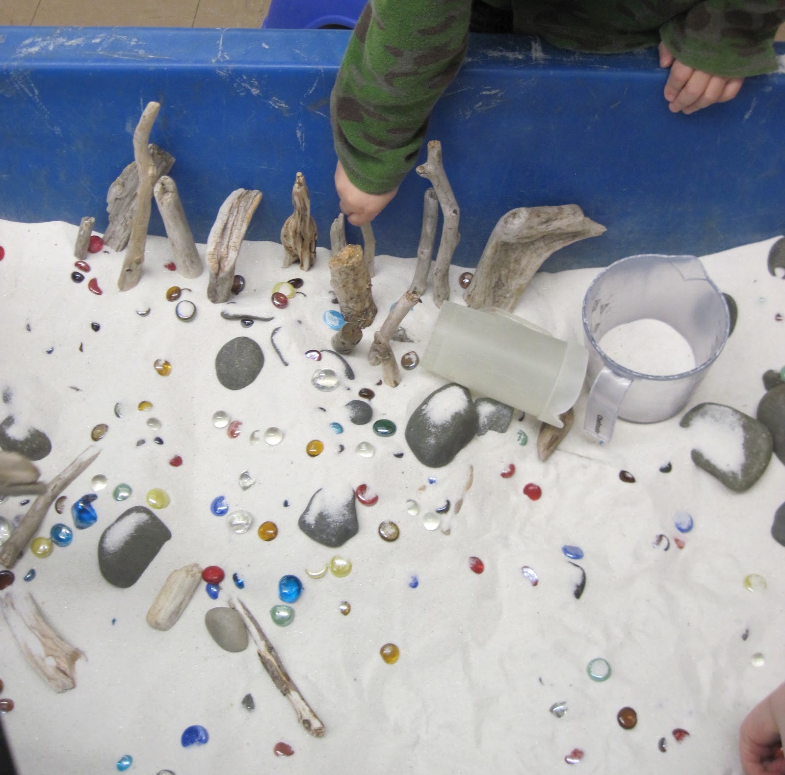 SAND AND WATER TABLES: GEMS, STICKS, AND STONES