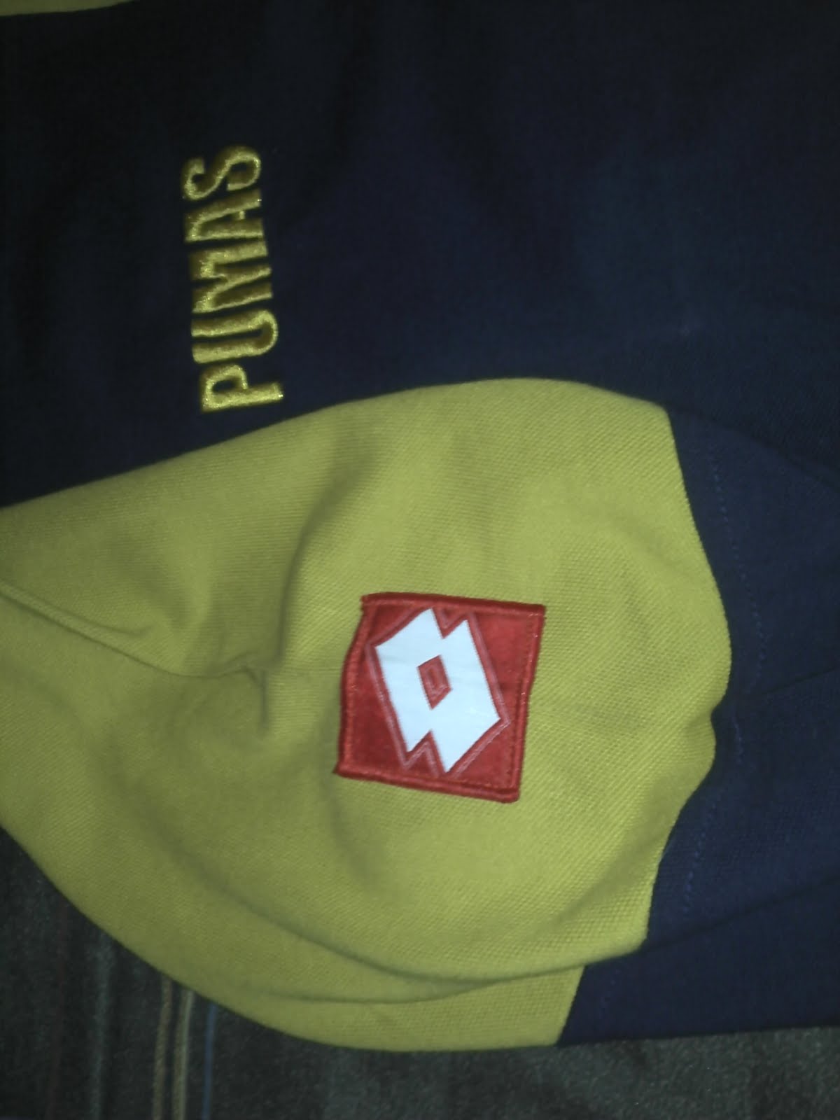 Tienda Rebel USA ®: Playera tipo Polo Pumas UNAM original Lotto