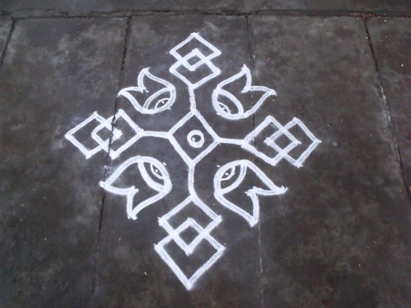 Rangoli designs/Kolam: 11-1 ner pulli kolam