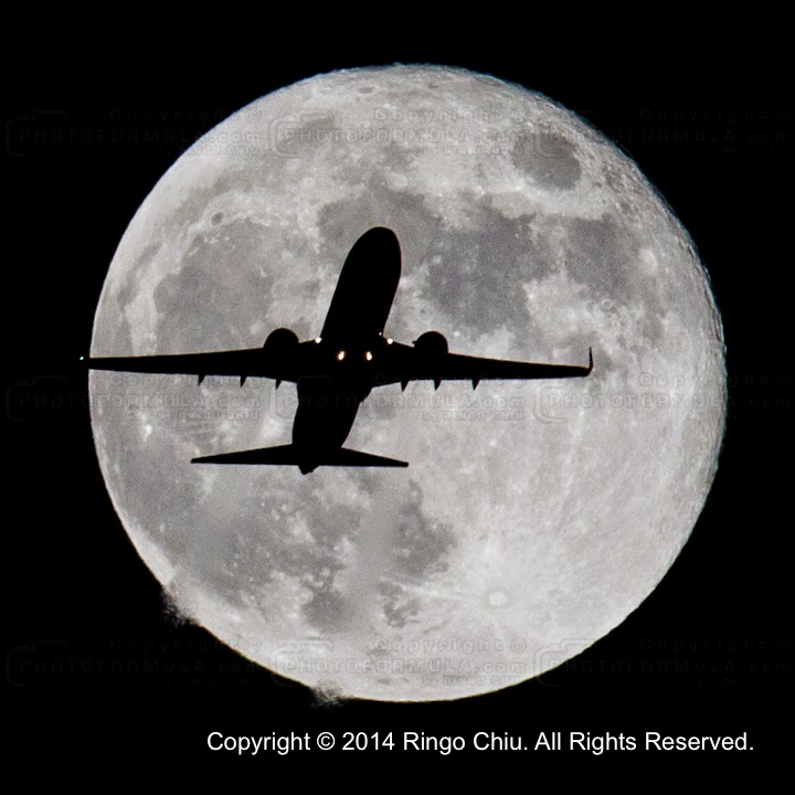 Ringo Chiu Photography: A plane flies past the full moon