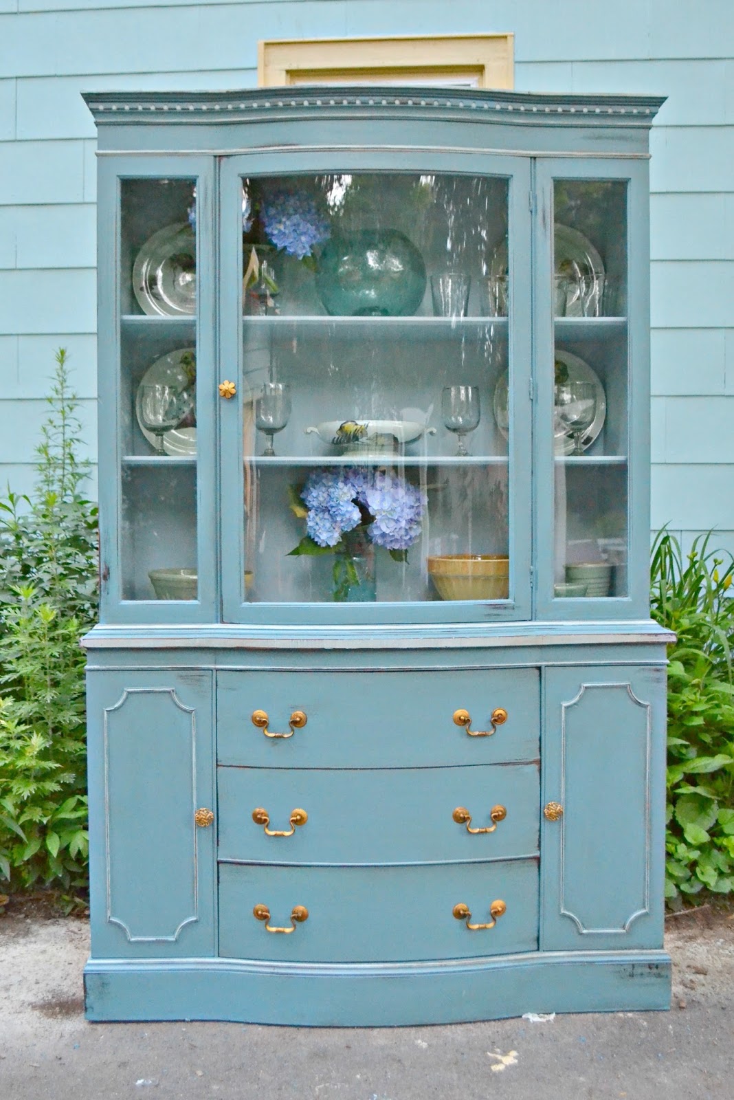 Heir and Space: An Antique China Hutch in Blue