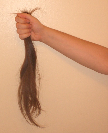 I chopped over a foot off of my hair... - Maple Leaf Mommy