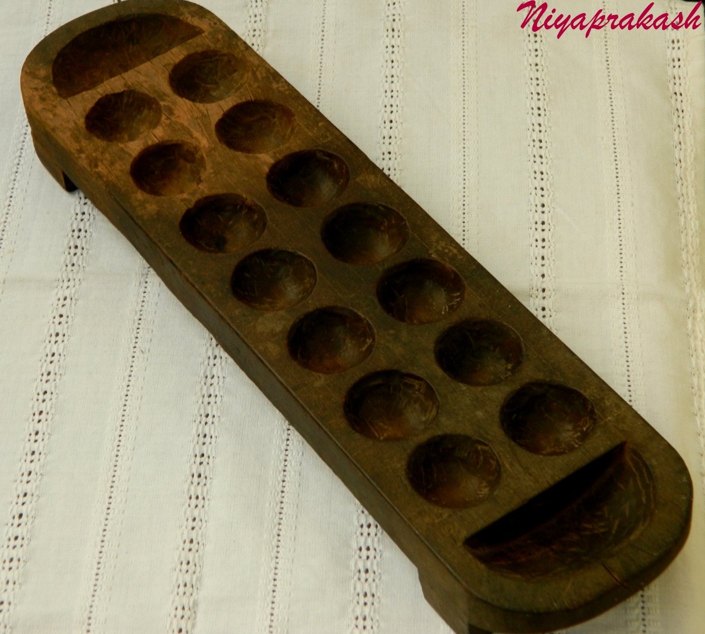 Niya's World: Photo of Pallankuzhi or Gurpale or Mancala (Oldest board ...