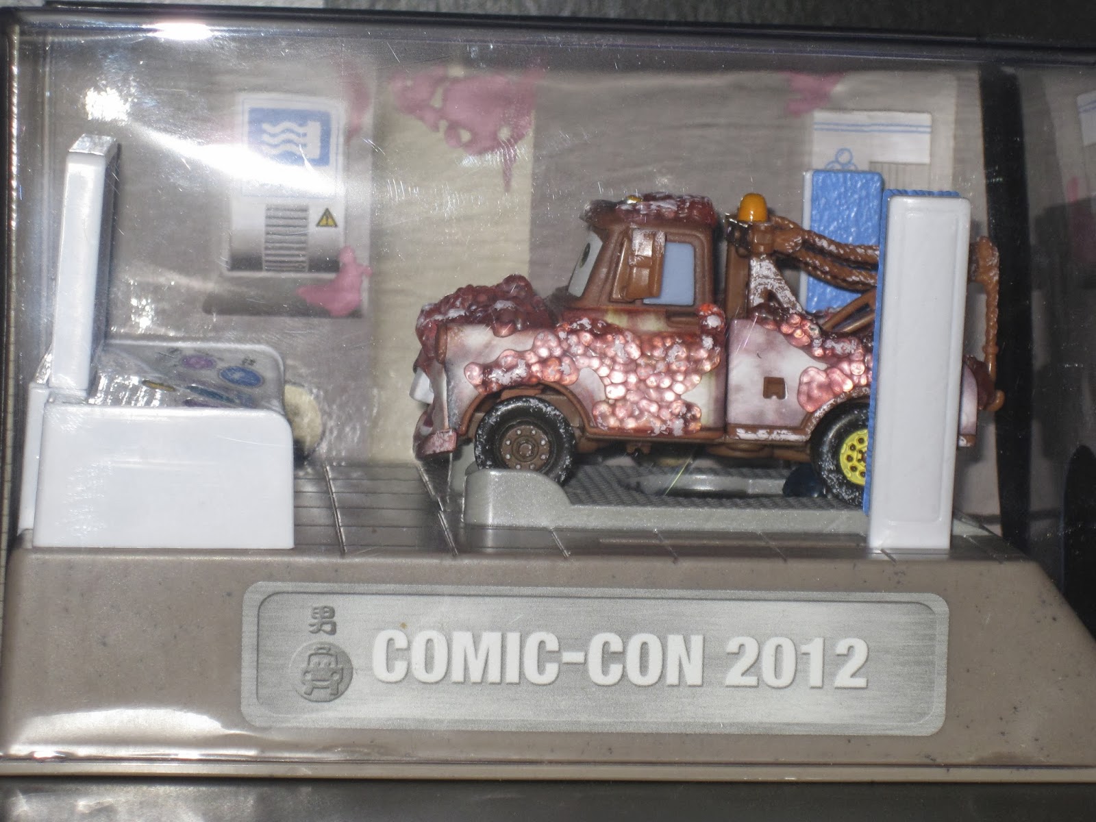 Dan the Pixar Fan: Cars 2: Comic-Con 2012 Exclusive Tokyo Bathroom Mater