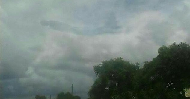 Humanoid figure in sky