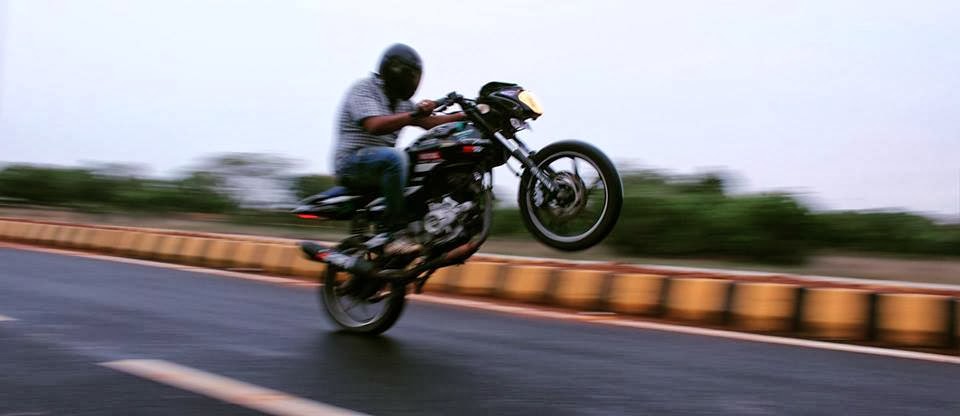 Engine Freak: STUNT TUTORIAL : How to Pop a Wheelie on A Bike?