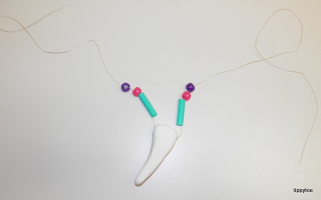 Tippytoe Crafts: Dinosaur Tooth Necklaces