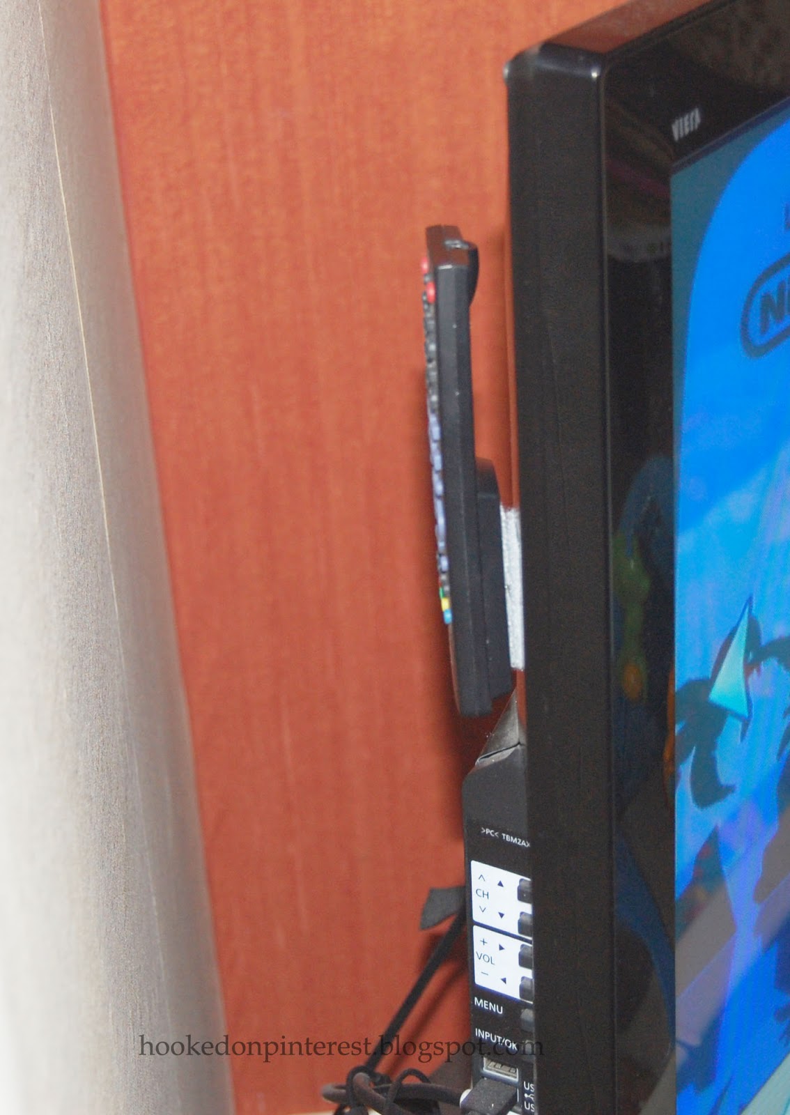 Hooked on Pinterest: Velcro Remote Storage
