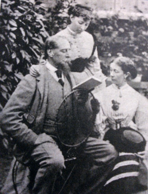 British Art: Charles Dickens reading aloud to his daughters.