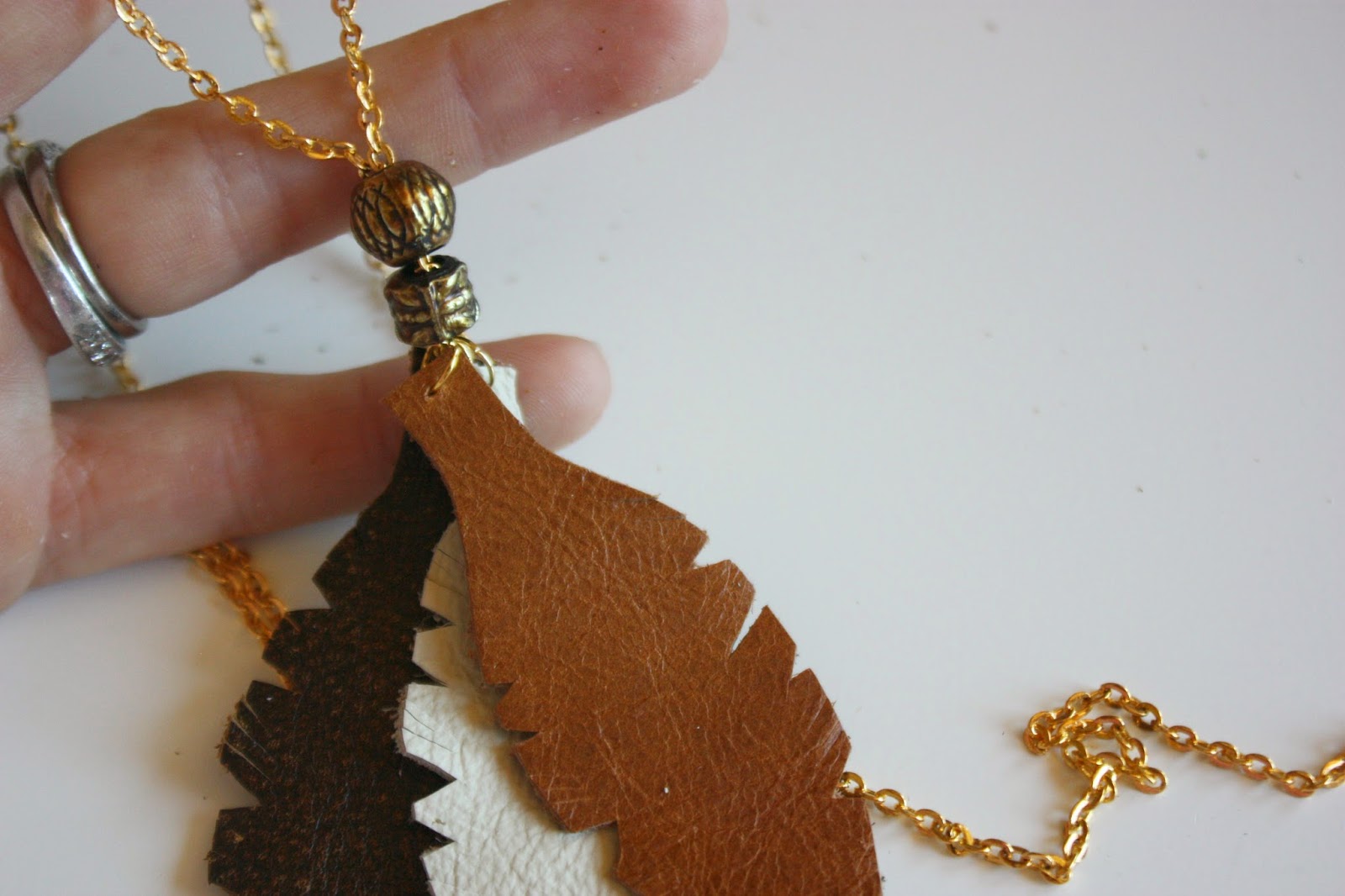 Step 8: String on chain and add decorative beads (optional)