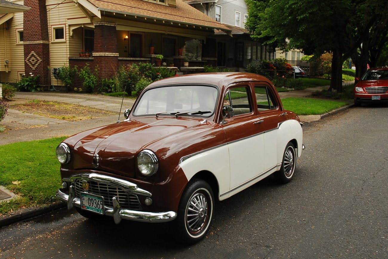 OLD PARKED CARS.: 1958 Triumph TR-10.