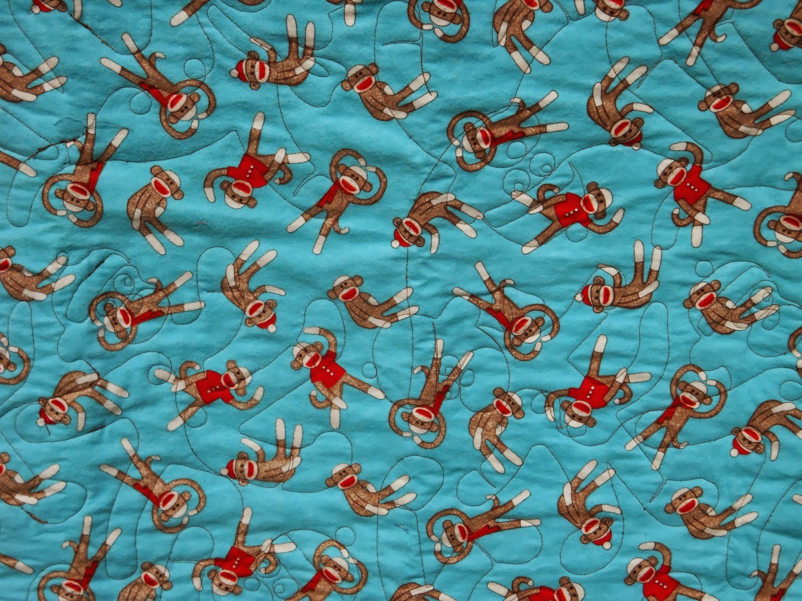 Val's Quilting Studio: A Sock Monkey Quilt Finish for our New Grand-Baby!