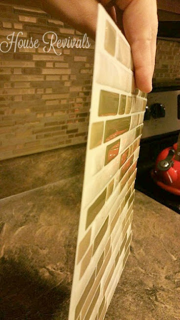 The dimensional tiles seem to be a vinyl type of material, and are very ...