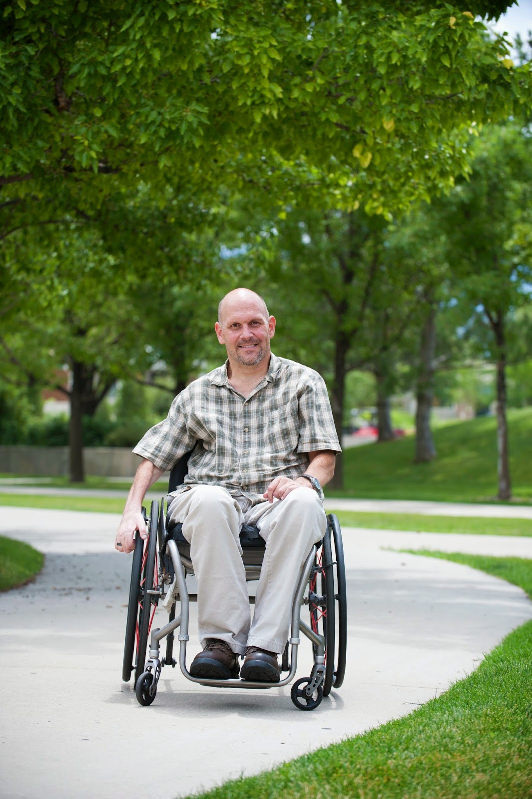 Paralyzed SLCC prof inspires by living ‘normal’ life